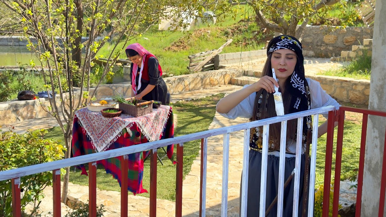 Painting the fences of the village house and cooking the traditional ...