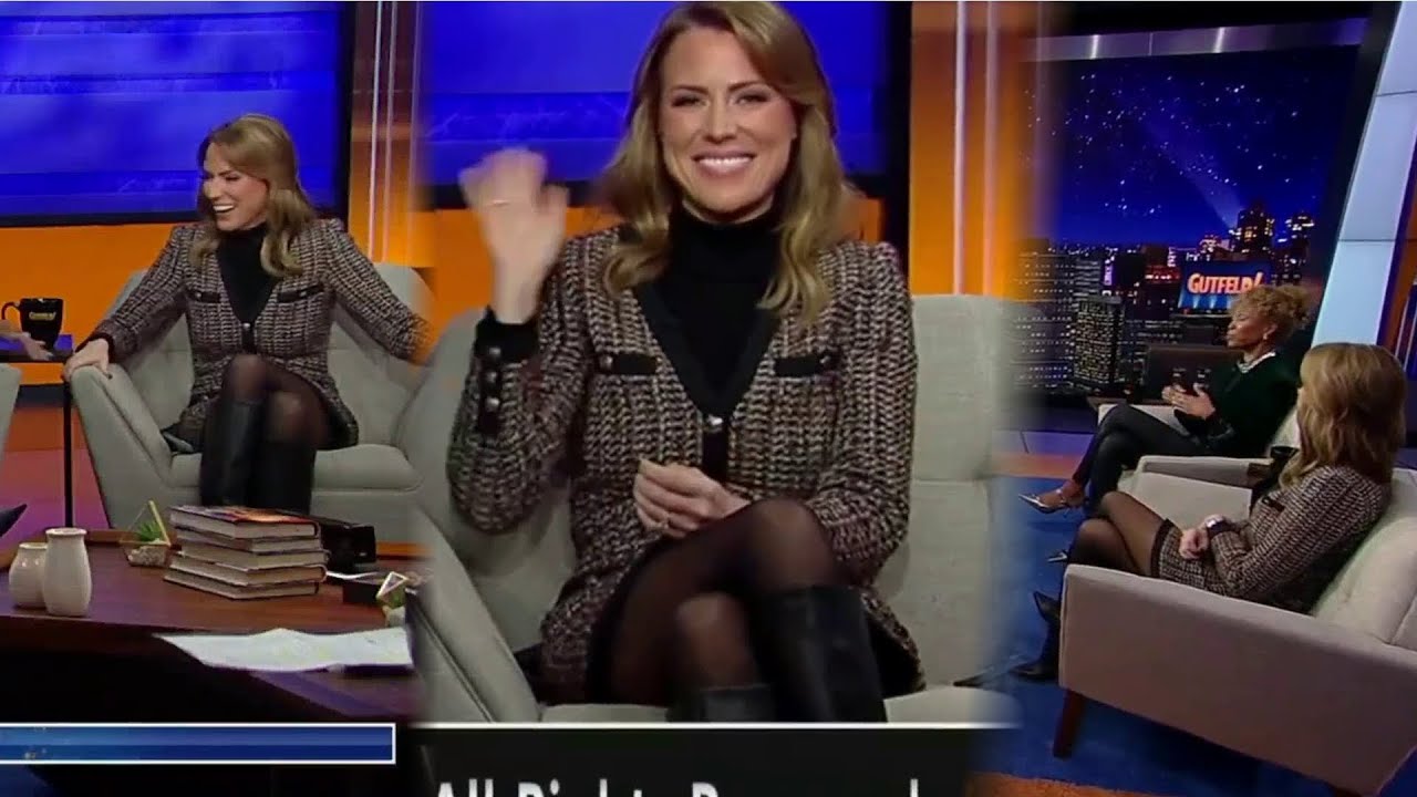 Erin Perrine wearing a short business suit with black pantyhose and ...