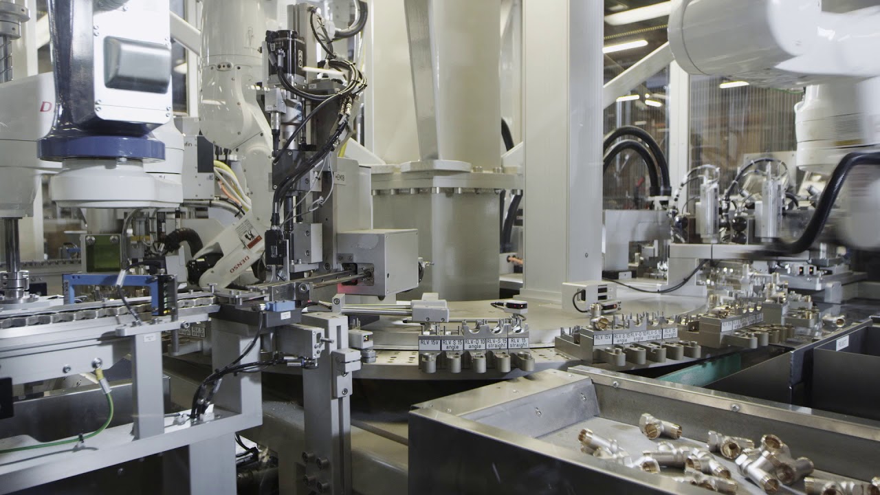 DENSO Robots - pick & place of valves for heating systems - YouTube