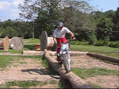 Front and rear wheel hopping on logs - Motorcycle trials - YouTube
