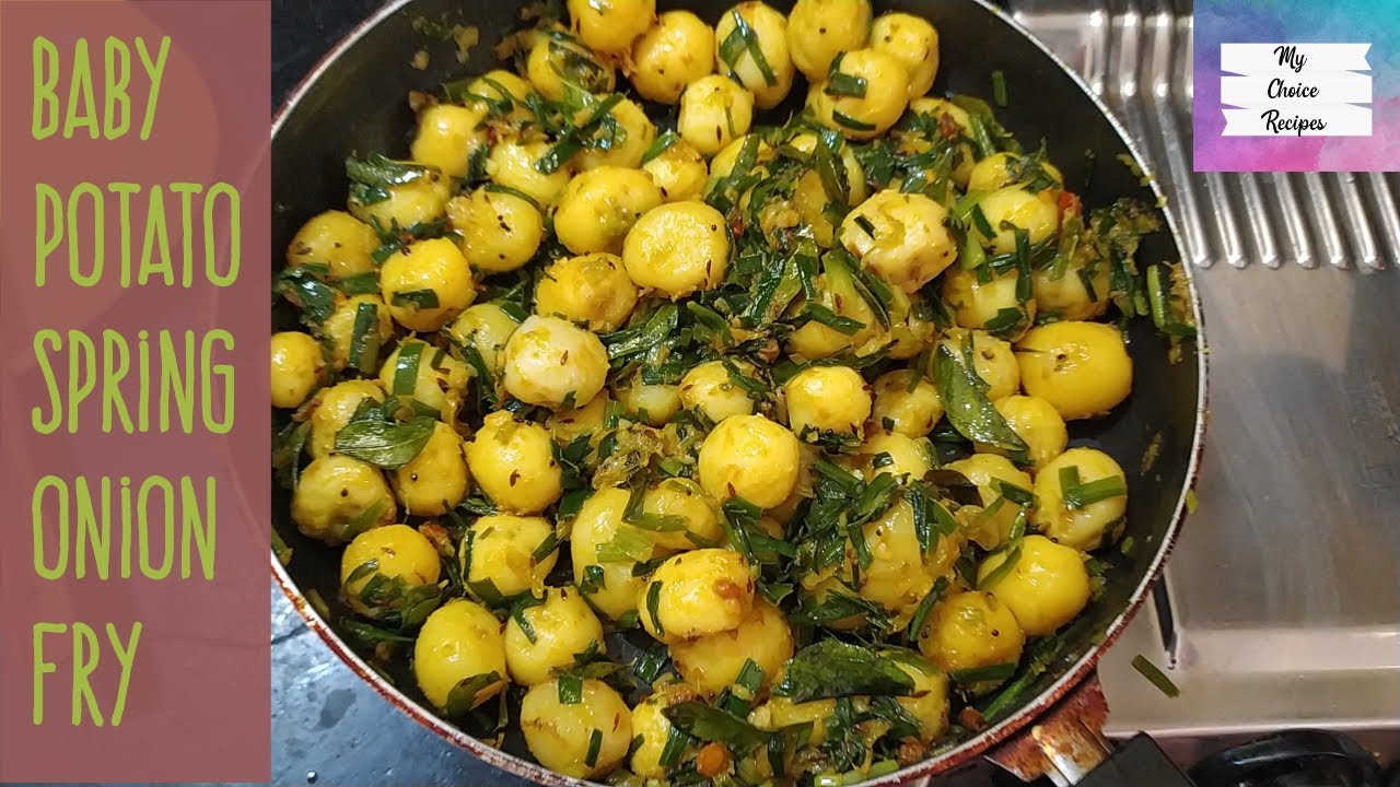baby potato spring onion fry Spring onion potato sabzi Stir fry ...