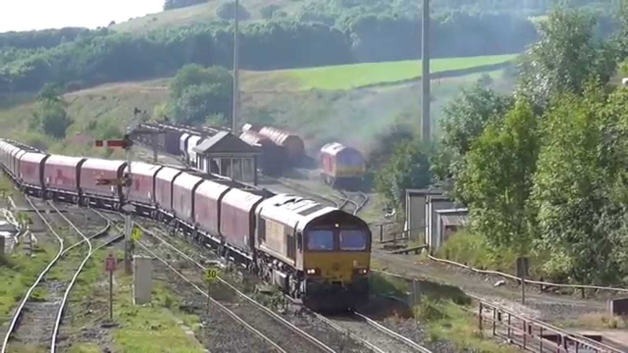 DB schenker 66125 departs from peak forest with loaded stone train ...