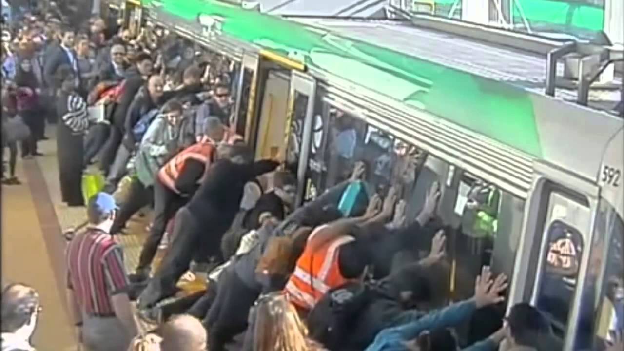 Train rescue: People power frees man trapped against platform at Perth ...