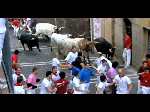 Watch: Annual running of the bulls in Spain - YouTube
