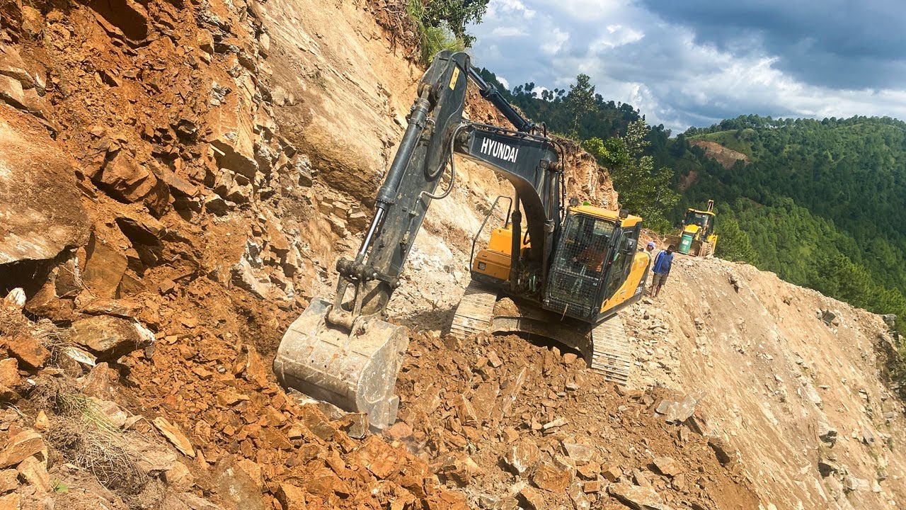 Defying Gravity: Building a Mountain Road with an Excavator | Excavator ...