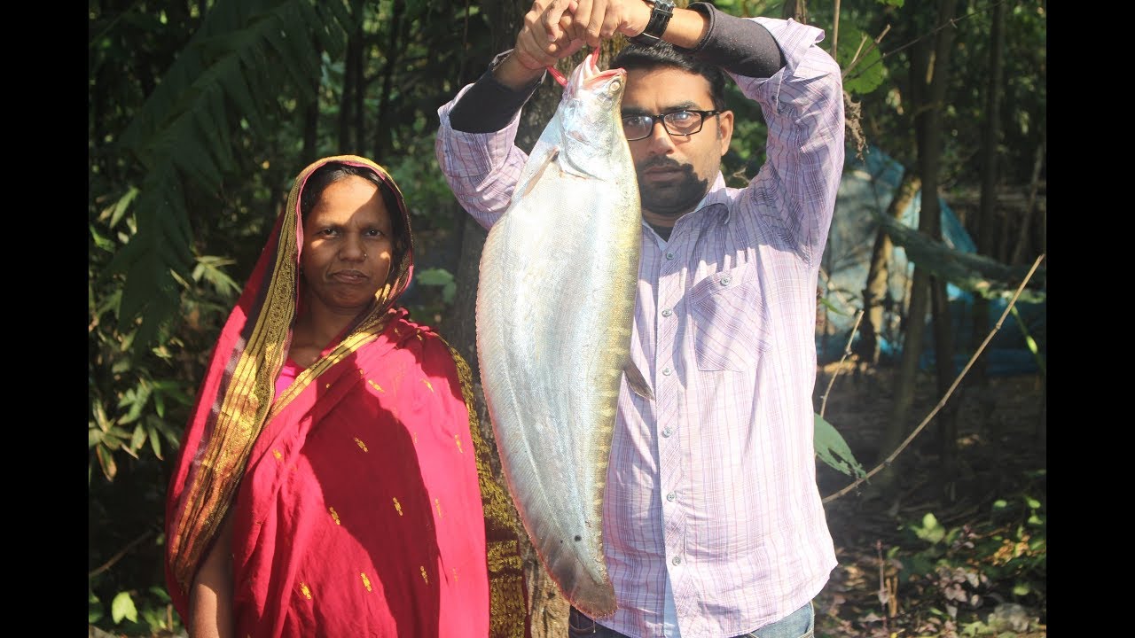 Big size Clown knife fish curry prepared by grandmother - YouTube