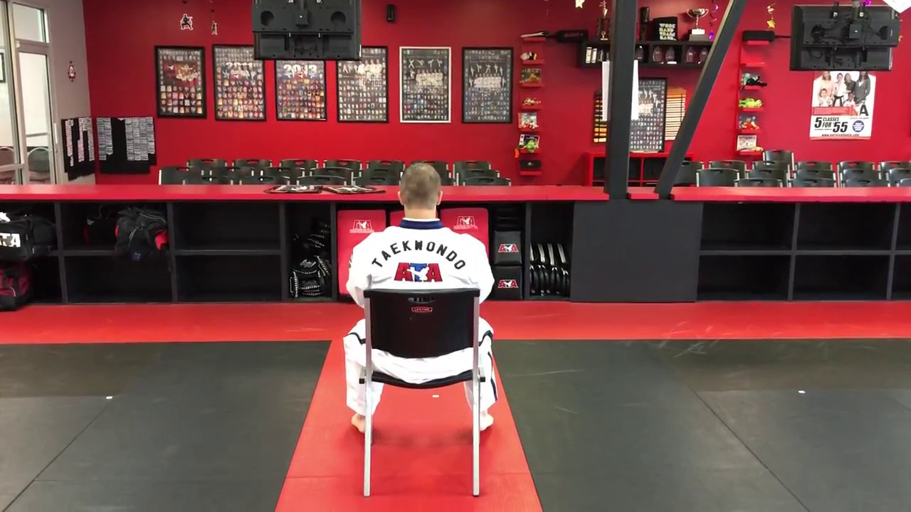 How to perform a side kick over a chair (back view) - YouTube