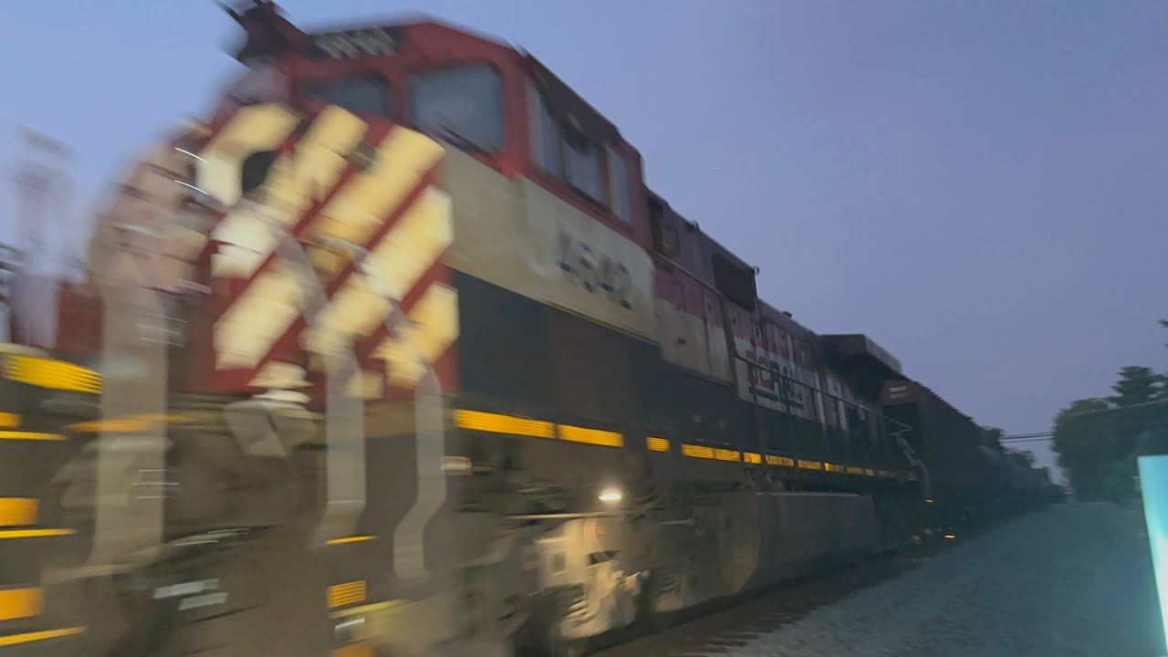 NS 9606 C44-9W leads NS 65E through Manville NJ with a CN SD70M-2 and BCOL 4642! 8/30/2023 - YouTube