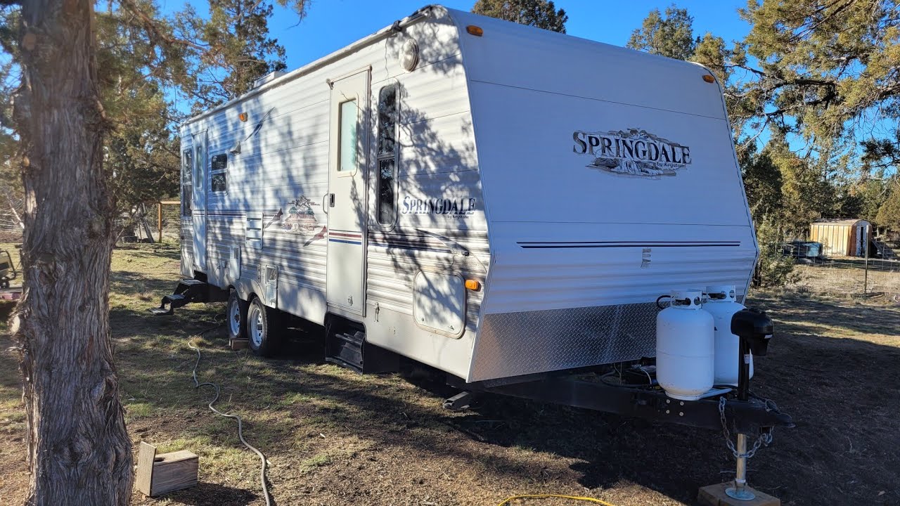 2007 keystone Springdale 266 power converter replacement - YouTube