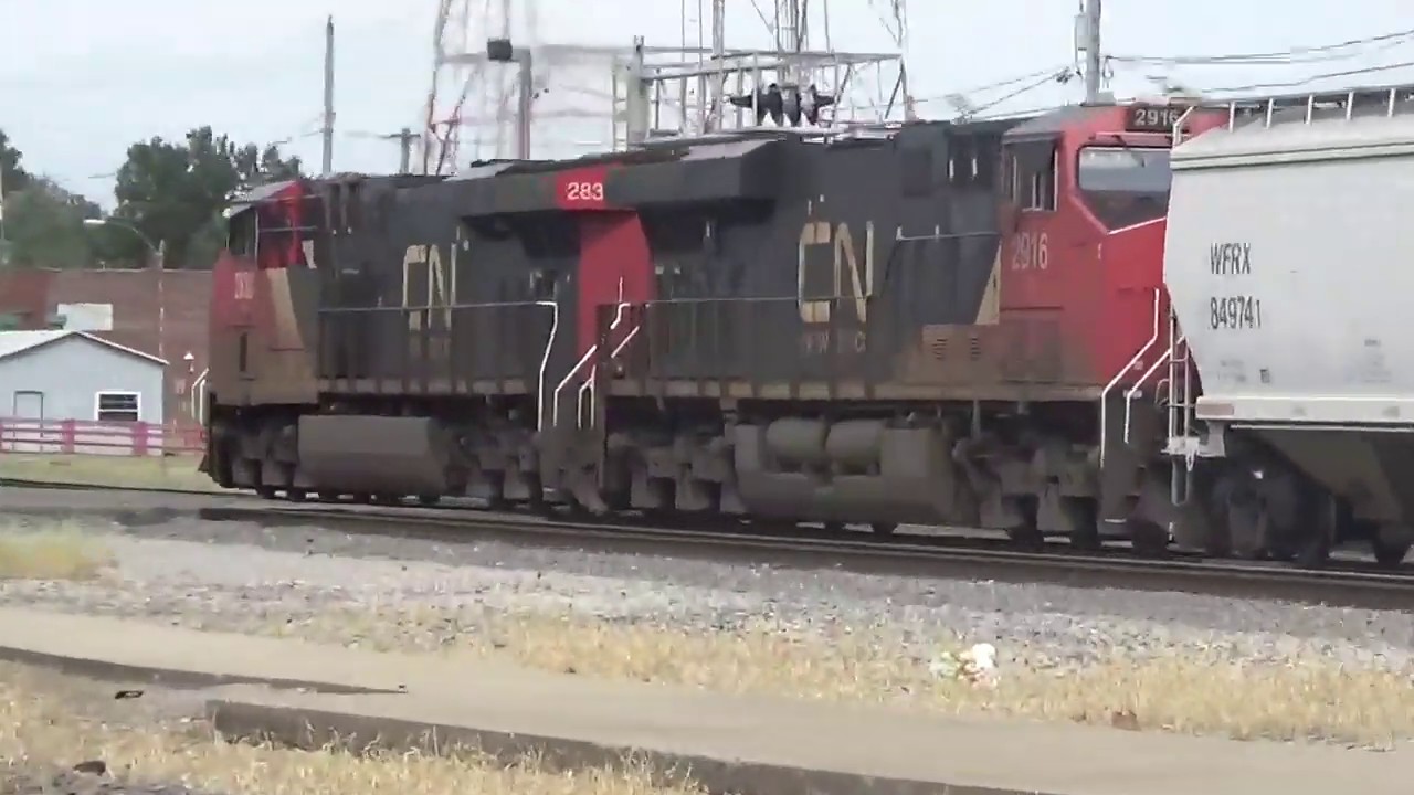Two CN Gevos lead a northbound CN WFRX grain train in Centralia ...