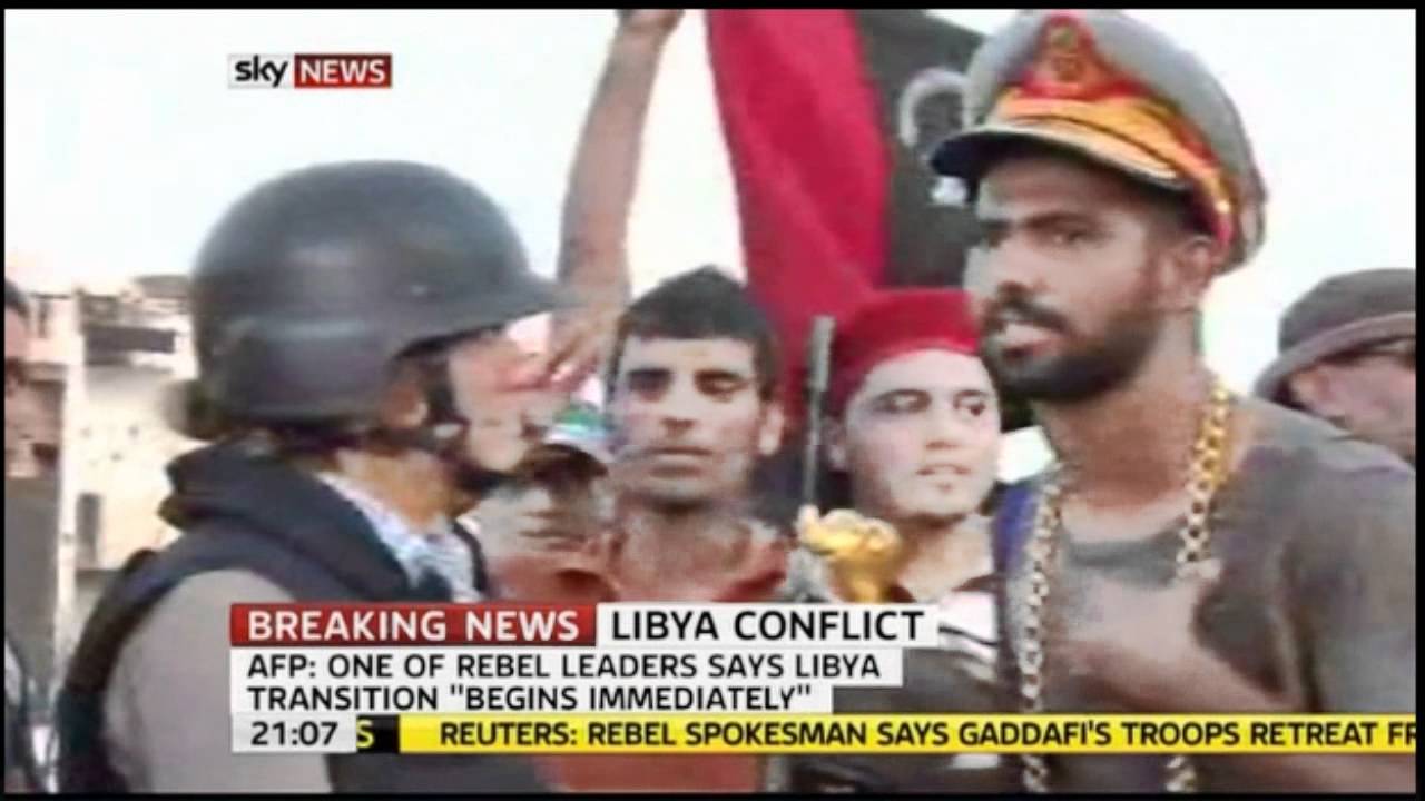 Gaddafi's Hat video in HD: Libyan rebel found it in Gaddafi's bedroom ...