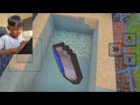 Tiku building Frog house in Minecraft