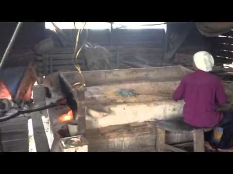 Traditional sago processing - YouTube