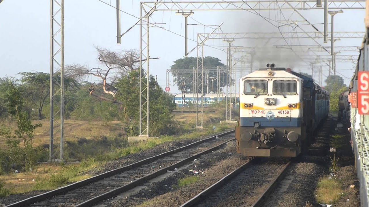 12779 Goa express curves out to visapur with customary Pune WDP4D 40158 ...