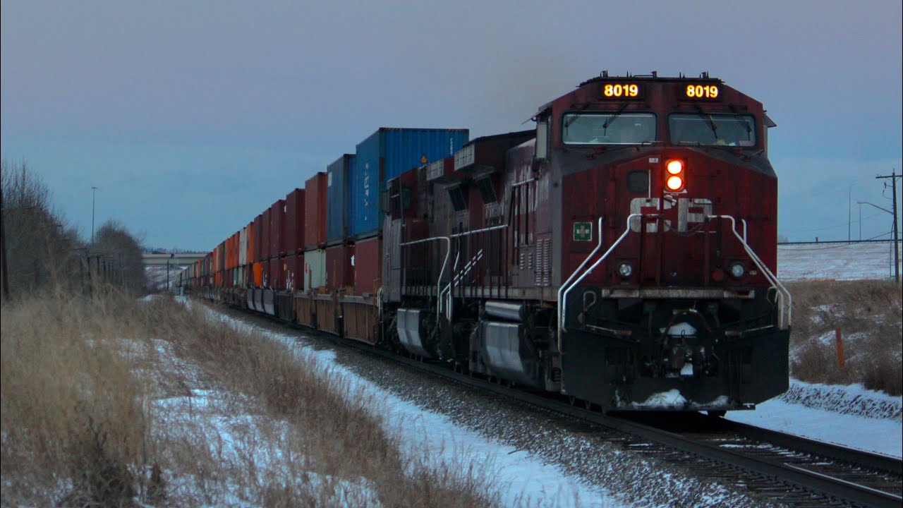 CN ET44AC!!!! CP 8019, CP 9775, CP 9706 and CN 3167 lead CP 198 east at Keith, Calgary, Alberta ...