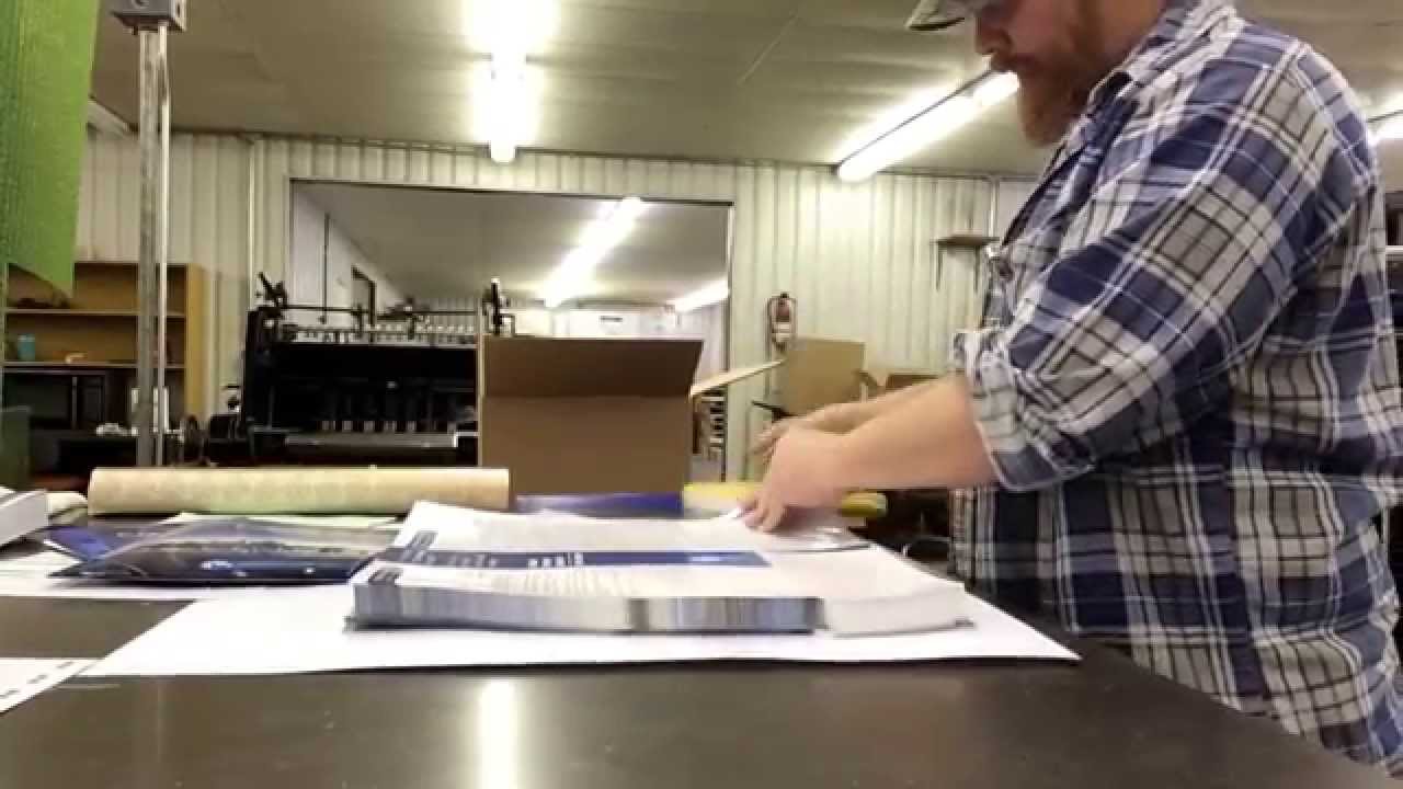 Hand gluing pocket folders - YouTube