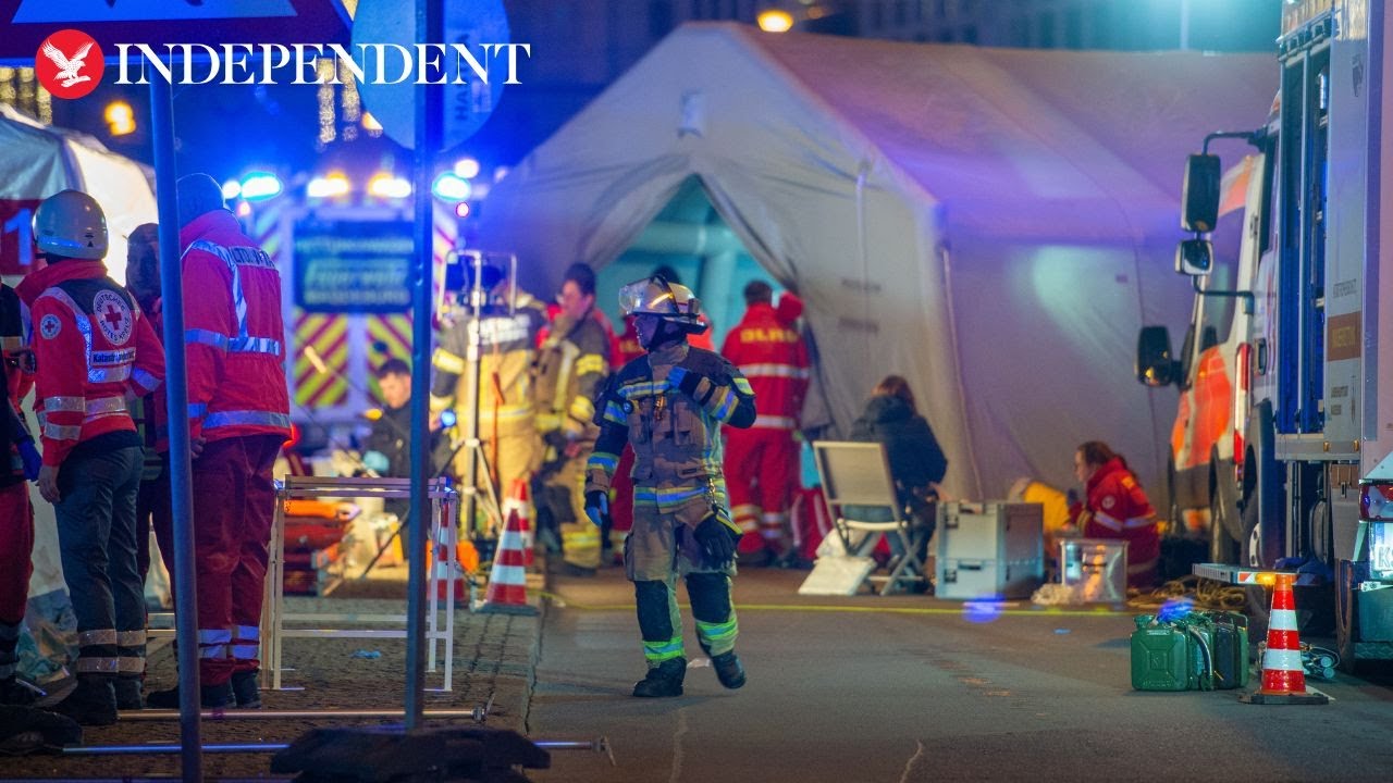German town mourns victims of Christmas market attack with flowers ...