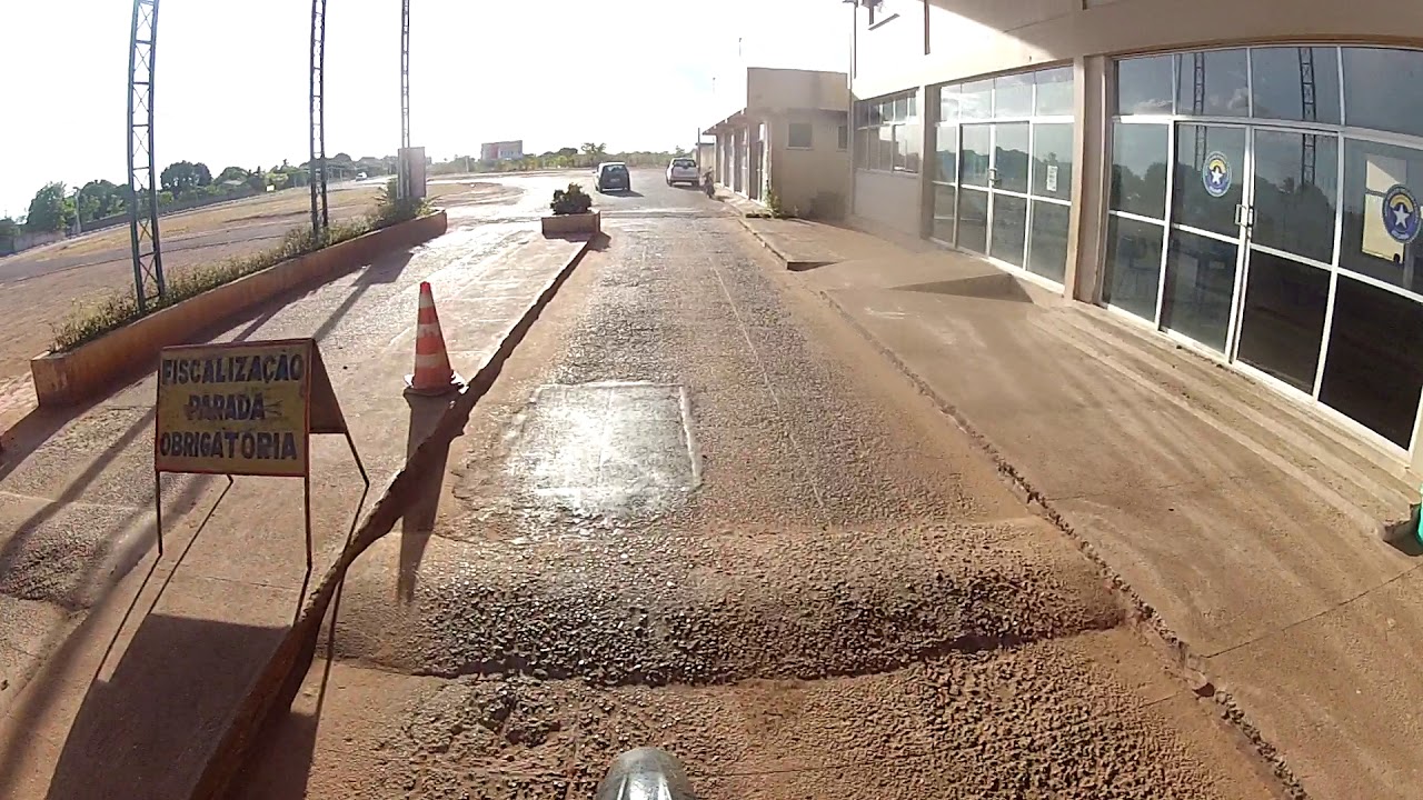 Crossing the border from Lethem Guyana to Bonfim Brazil by motorcyle ...