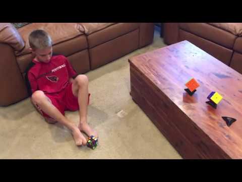 Luke Thoresen solves Rubik's Cubes with his feet