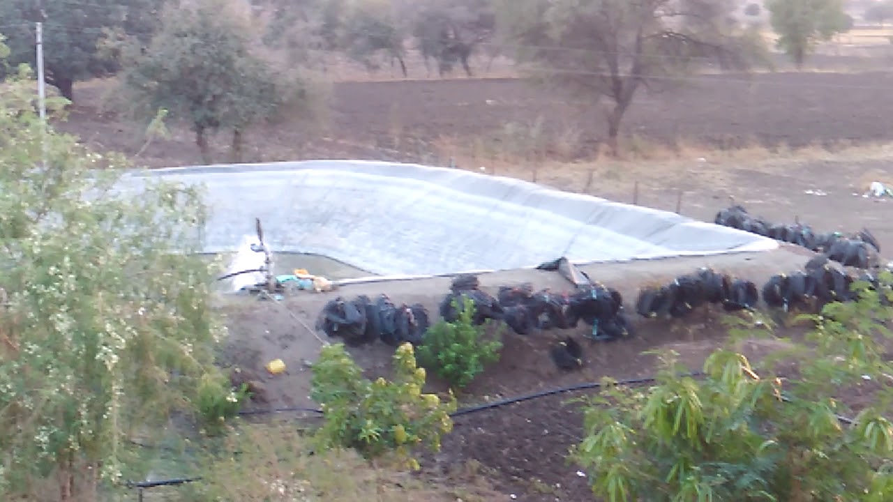 Farm pond and sprinkler irrigation system - YouTube
