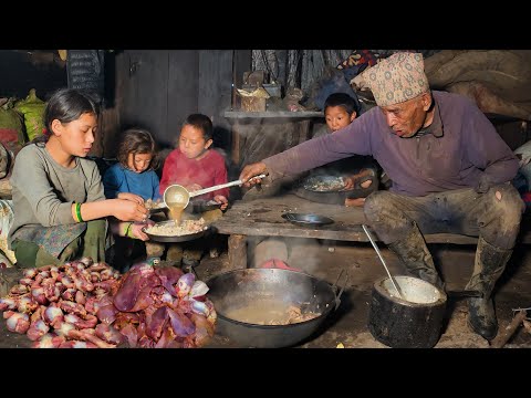 A Poor Himalayan Family Cooking Organic Chicken Gizzard Under A Leaking Roof