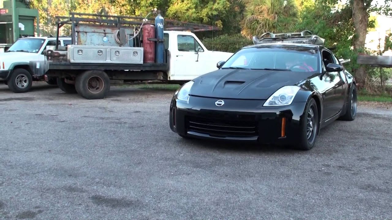 350z with headers and aftermarket exhaust sound and drive by - YouTube