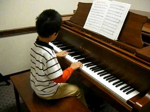 Spencer playing Minuet in piano - YouTube