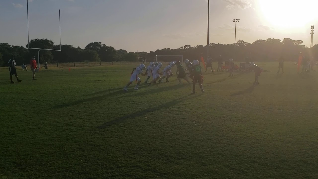 Kolby avoids the rush from a tall kid completes short pass for a short ...