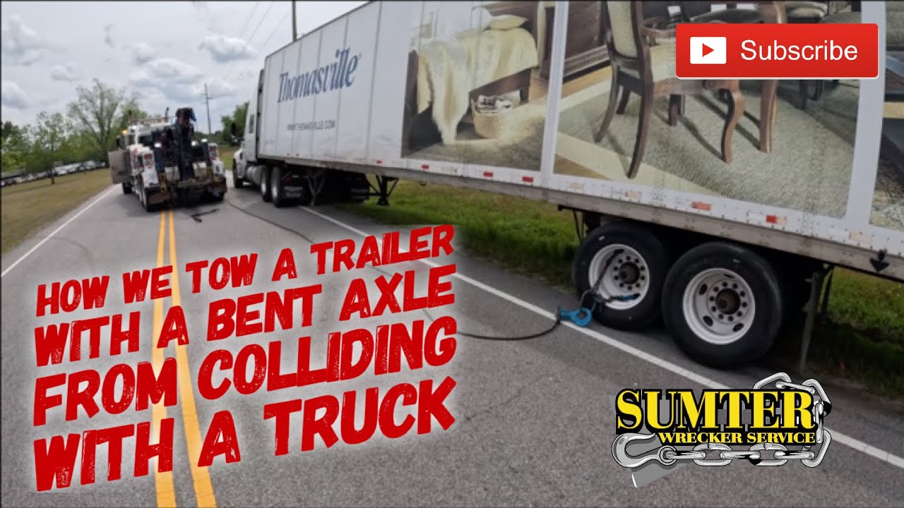 How we tow a trailer with a bent axle from colliding with a truck - YouTube