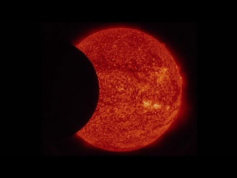 NASA | Earth and Moon Photobomb SDO