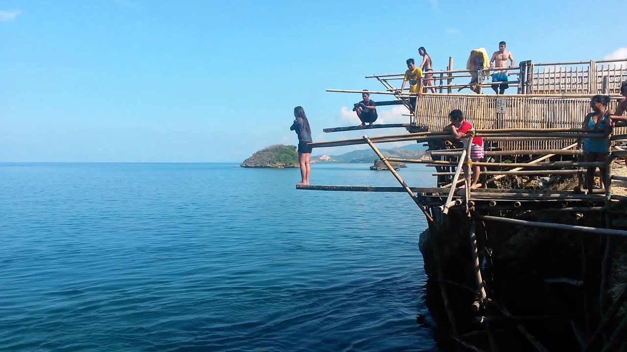 Michiko's cliff jump at Aron's Magic Island - YouTube