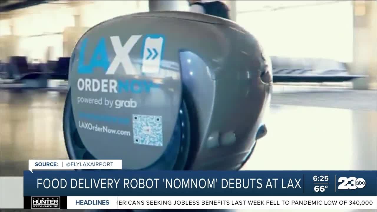 Food delivery robot 'NomNom' debuts at LAX - YouTube