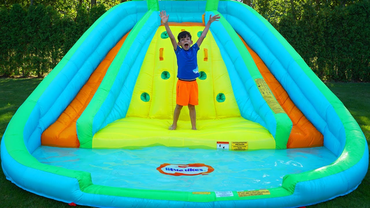 Play with Inflatable Toys and Slide - YouTube