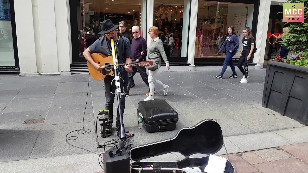 A busker makes a fun improvisation guitar and didgeridoo - YouTube