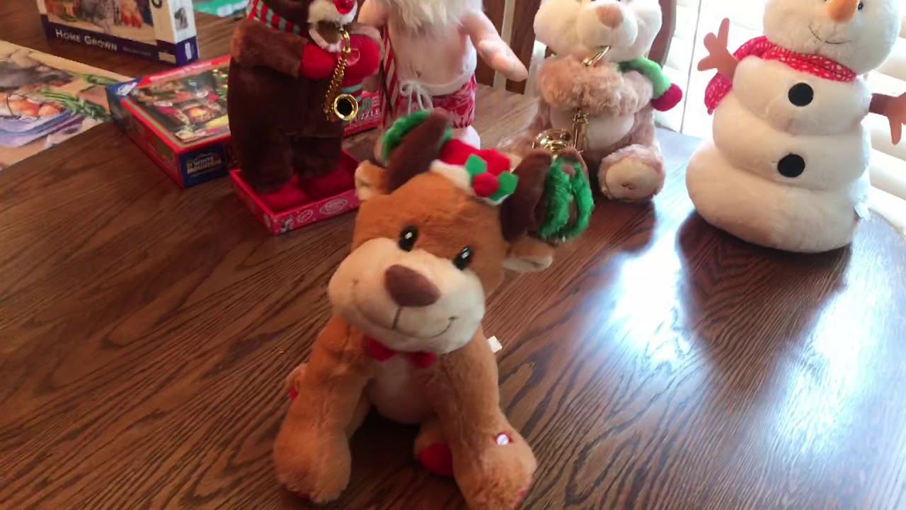 Reindeer Singing “Jingle Bells” with bells ringing on his antlers ...