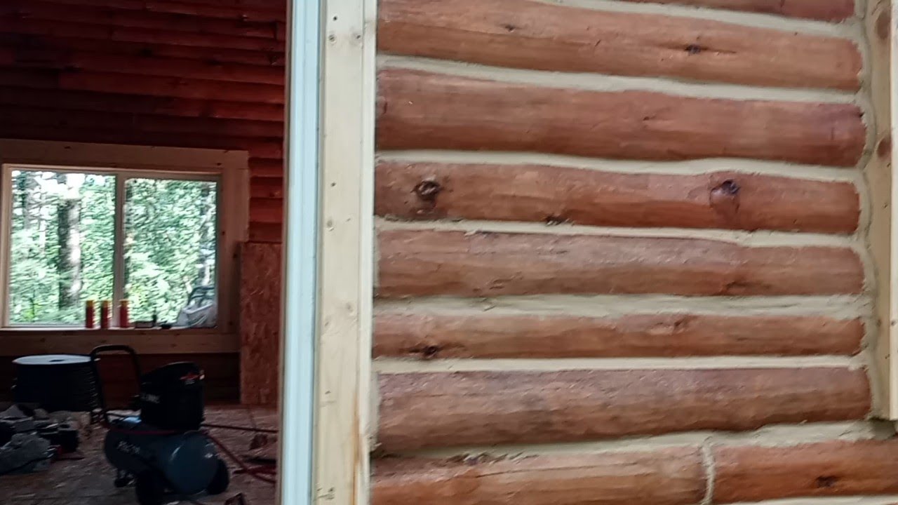 Log Cabin build 34, Chinking - YouTube