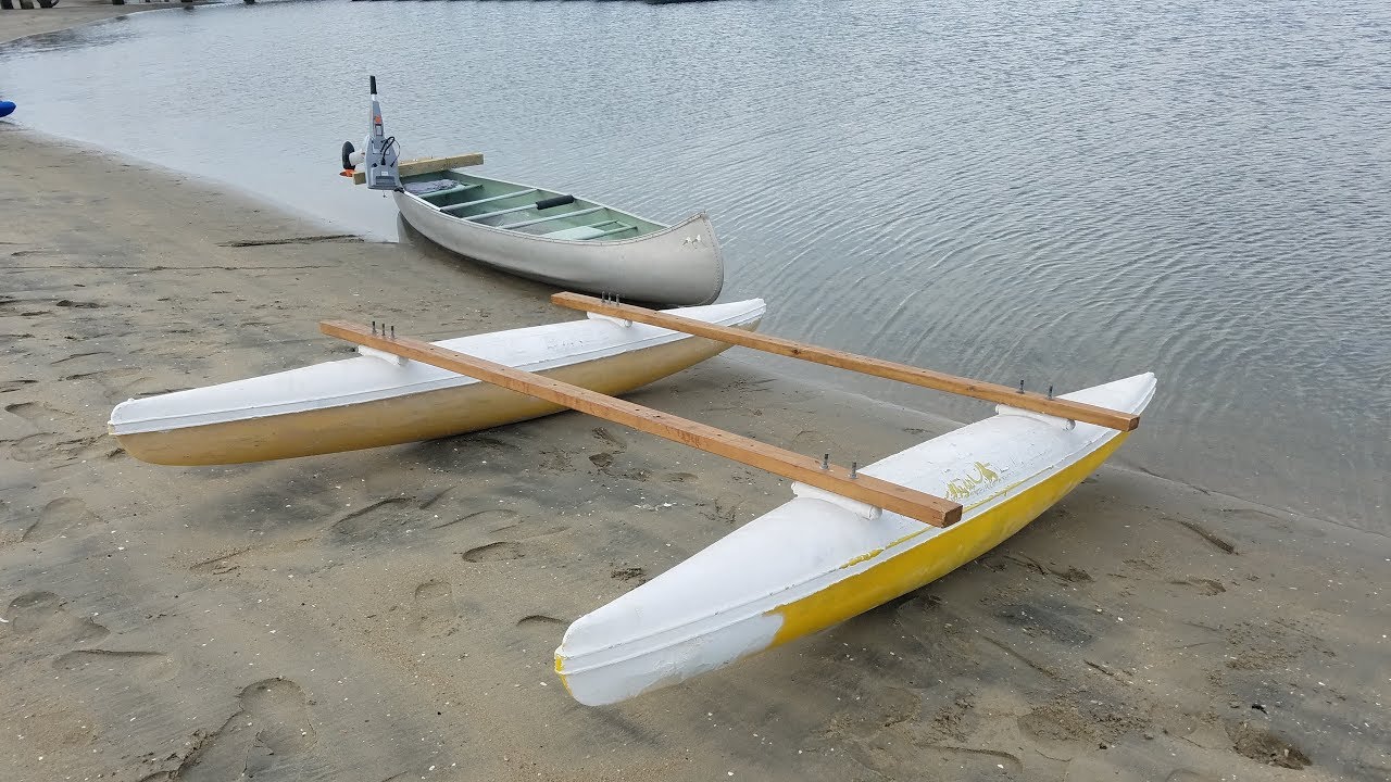 Stabilized aluminum canoe Sea-Nymph by two Hydrobike floats. Used with ...
