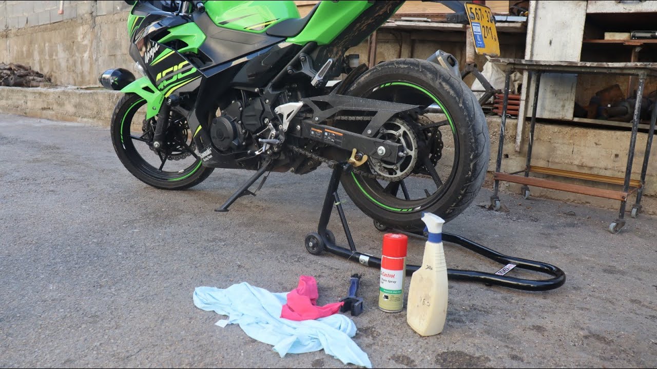 chain adjustment for kawasaki ninja 400 - YouTube