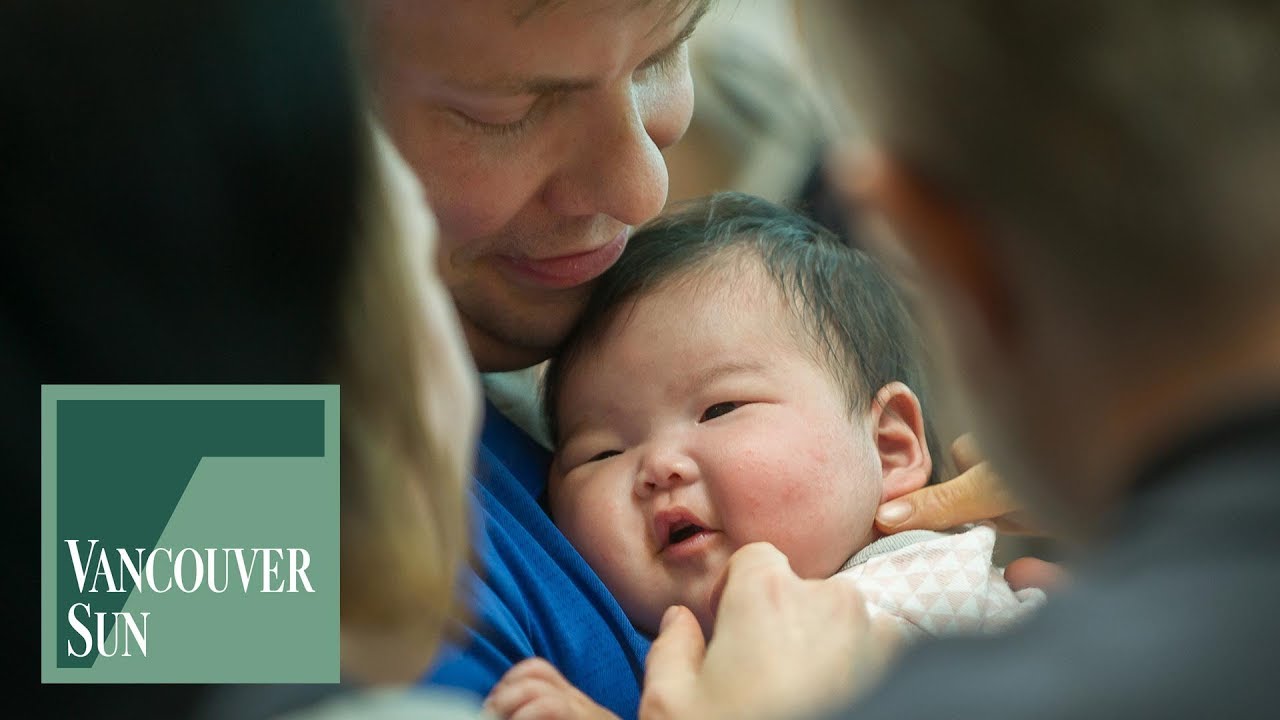 Family returns home from Japan with adopted baby after immigration hold ...