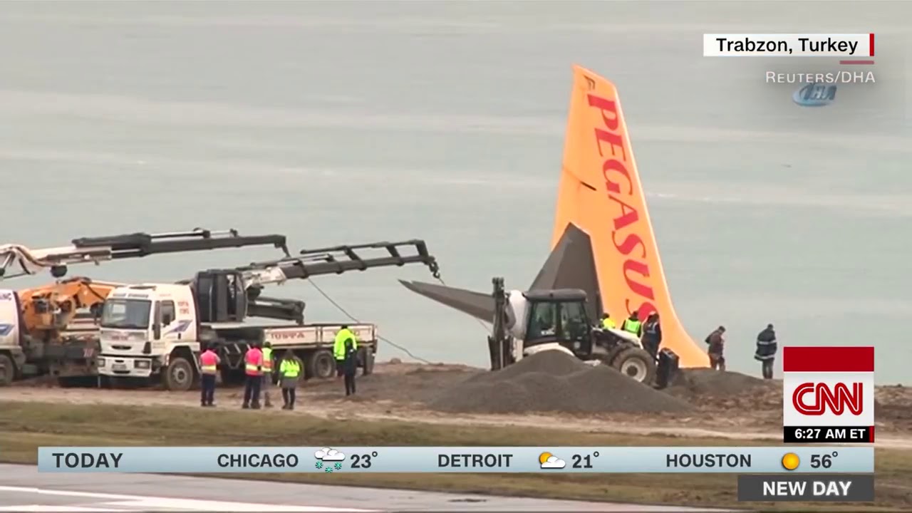 Plane Skids Off Runway, Gets Stuck On Cliff - YouTube