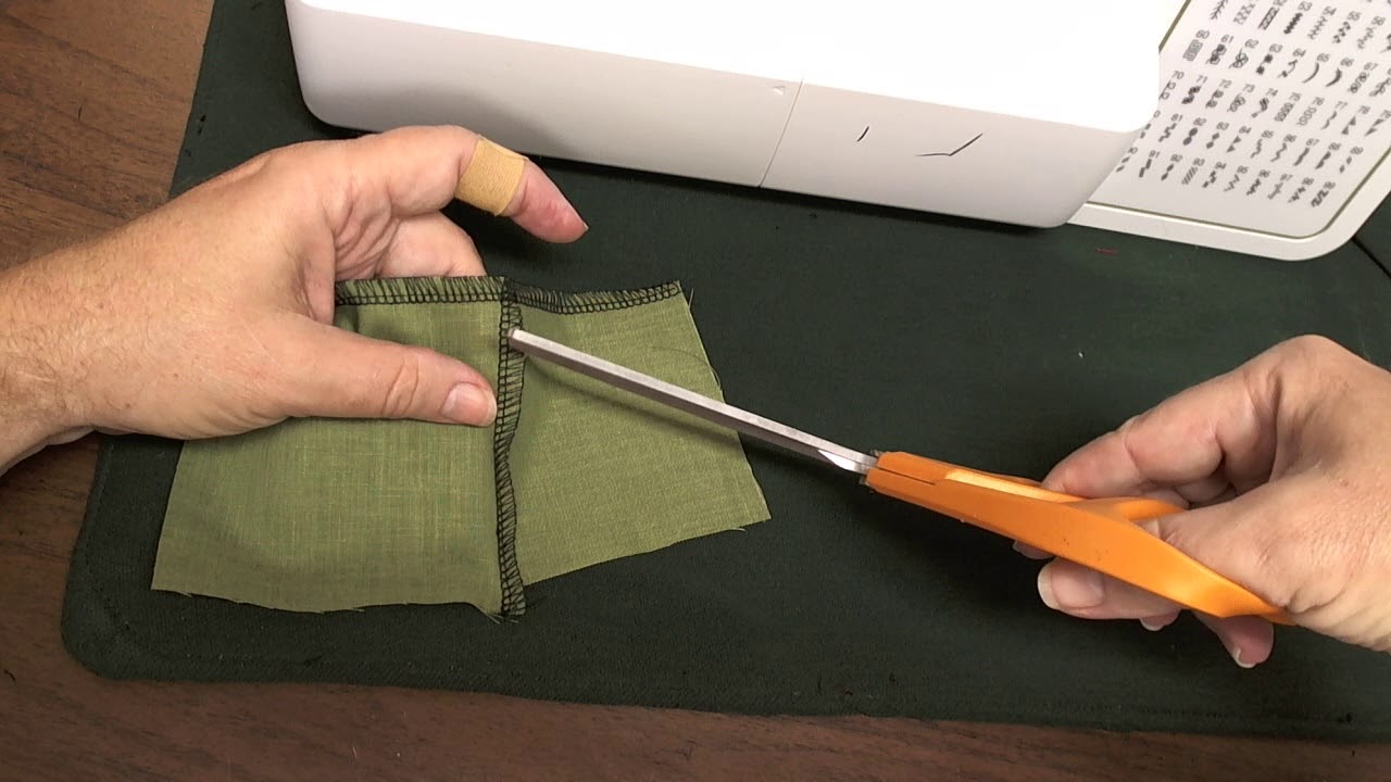 Less bulk in serged seam on the single fold hem - YouTube