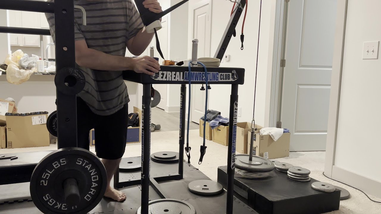 Arm wrestling exercises Plyometric side pressure against a chain with 3 ...