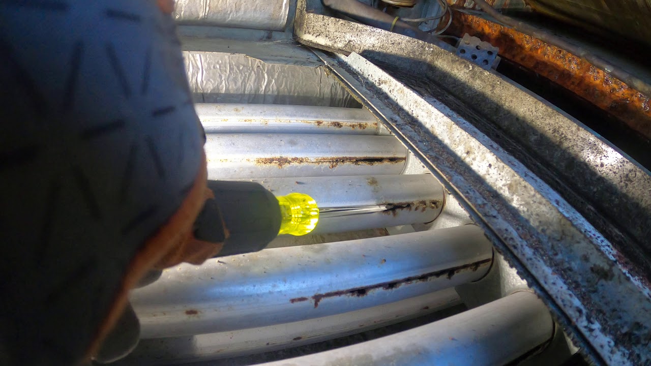 Holes in heat exchanger results in a change out. - YouTube