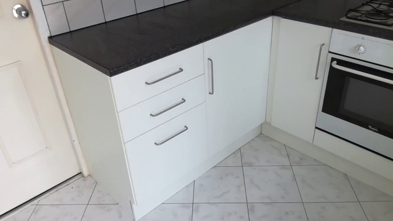 How to install standard Kitchen units with tiled flooring and ...