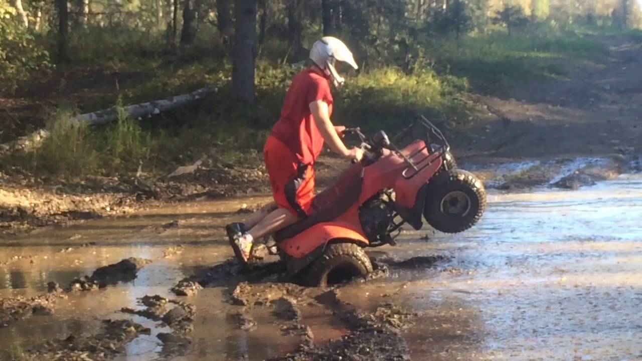 1983 Suzuki 125 Mudding - YouTube