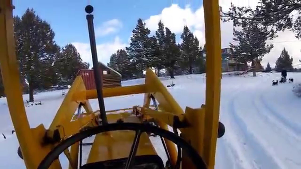 Backhoe Plowing Snow - YouTube