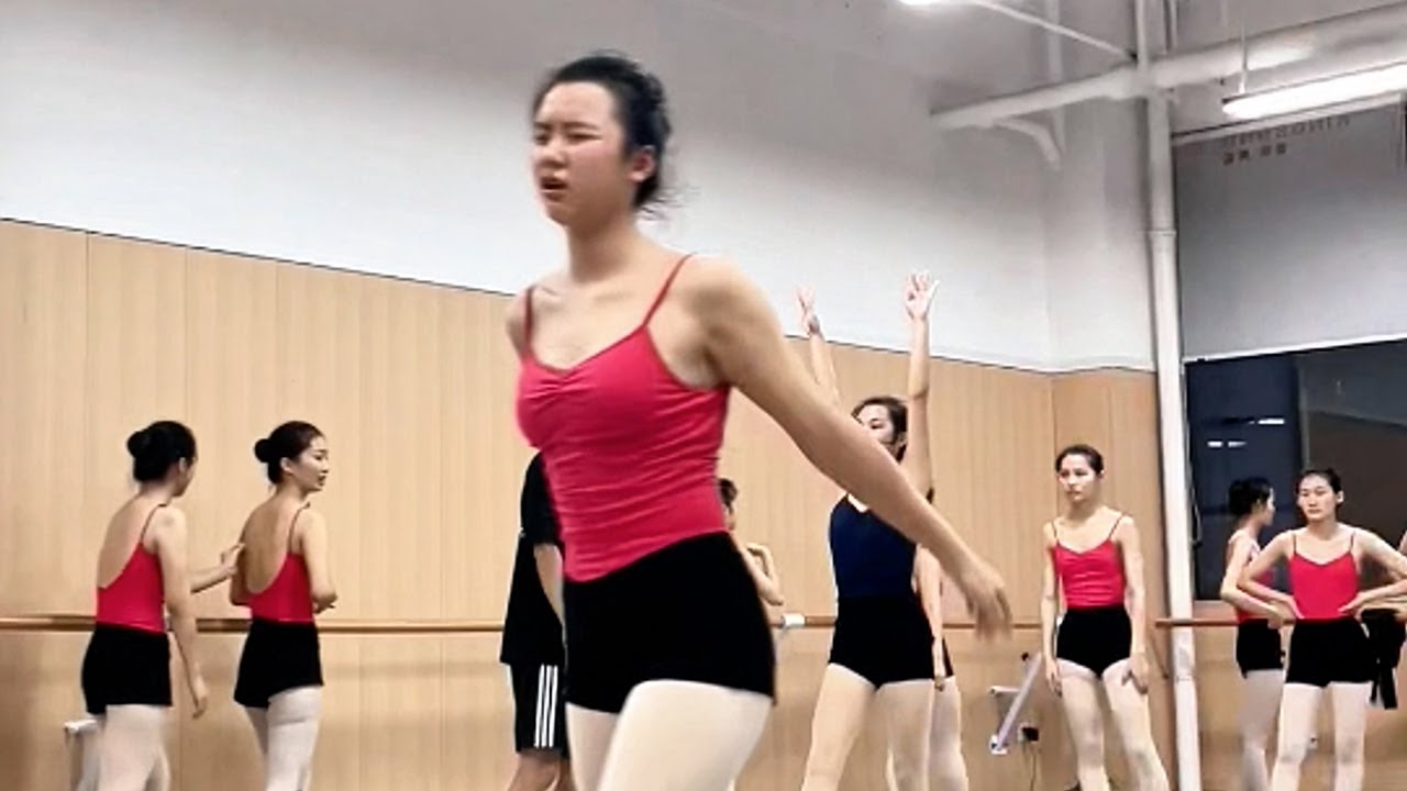 Leg and Jump Flip Training: Dance Student in Red, Confident & Beautiful ...