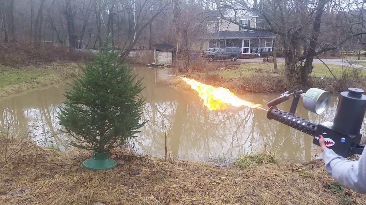 Flamethrower Xmas Tree disposal - YouTube