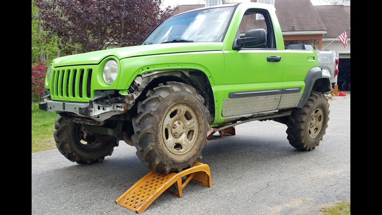 Jeep Liberty pickup with 33" tractor tires walk around - YouTube