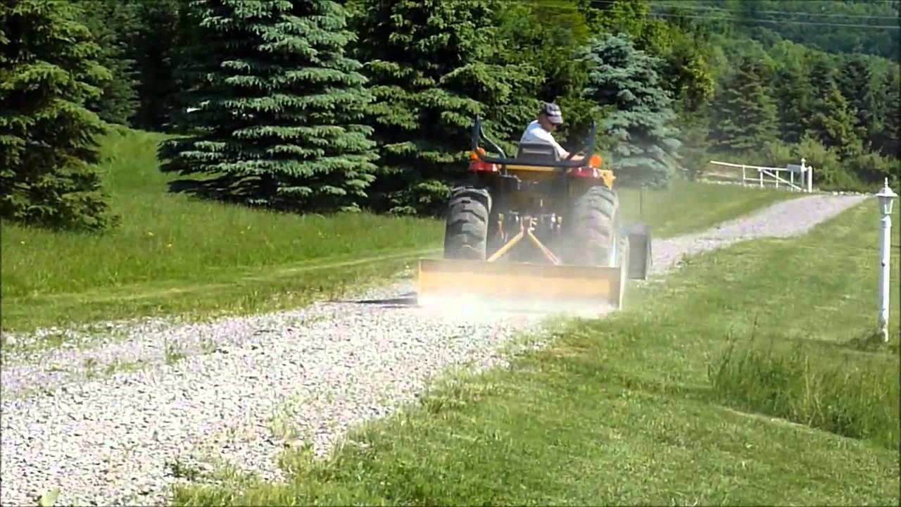 Challenger MT265B with CountyLine Box Blade, 6 ft - YouTube